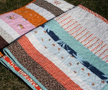 two baby quilts and a scrap winner patchwork squares i
